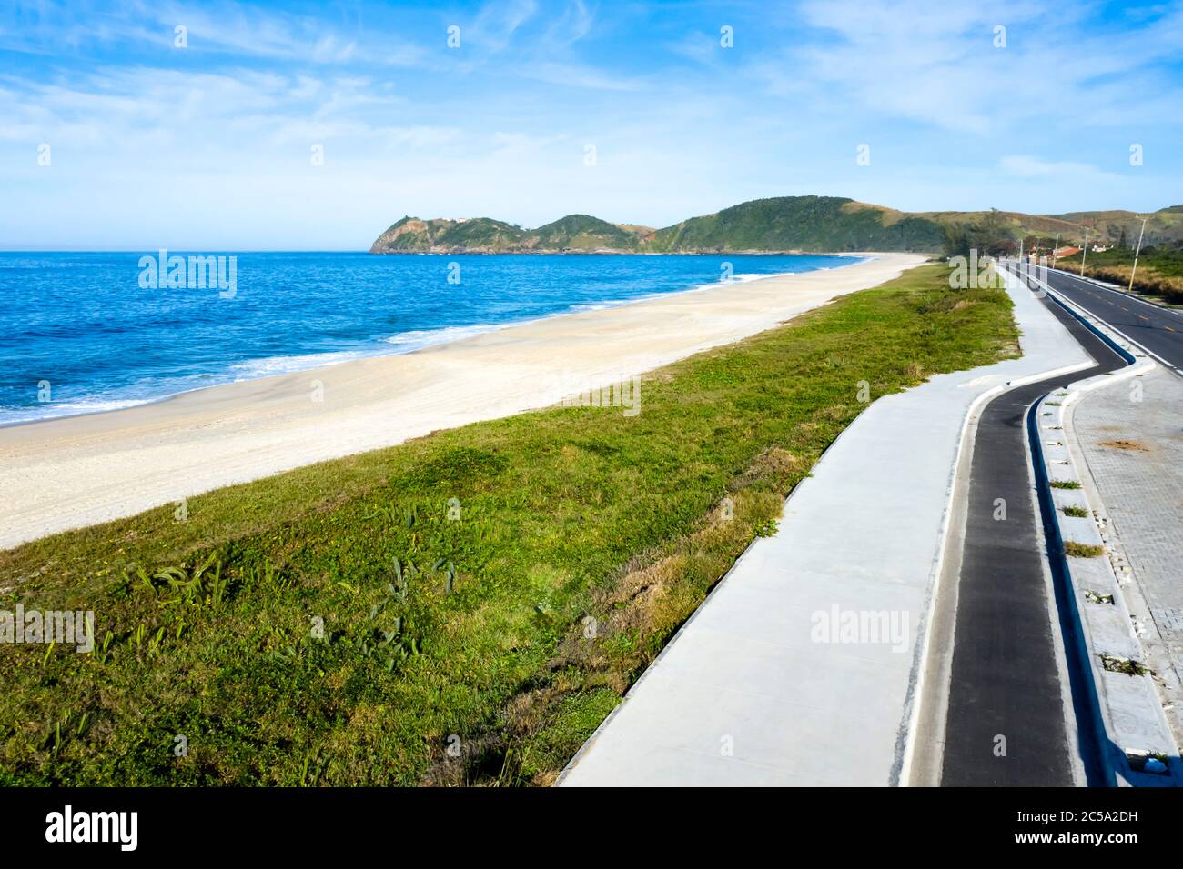 I walk by the sea. Beautiful beach and a road Stock Photo - Alamy