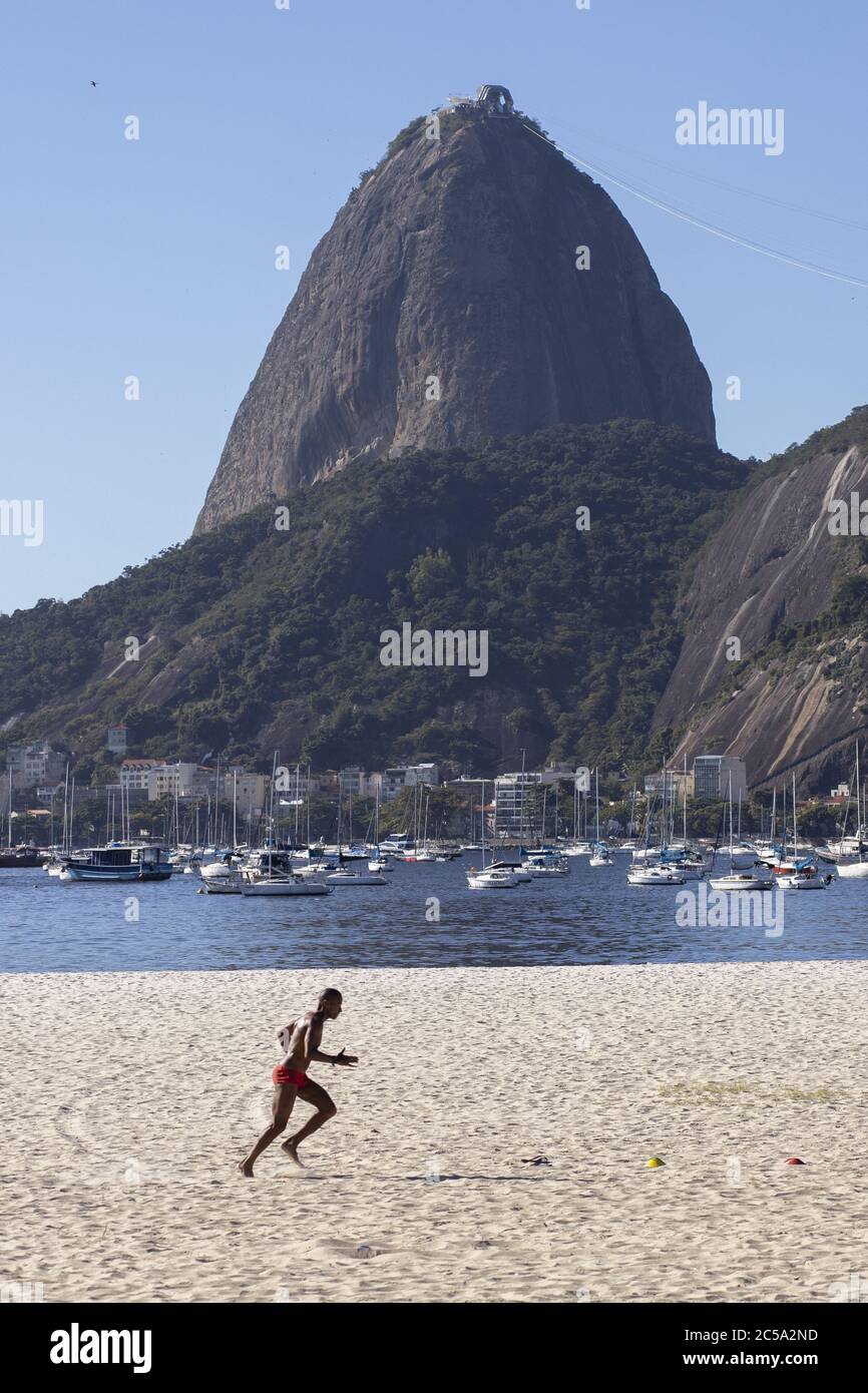 RIO DE JANEIRO, BRAZIL - Jun 18, 2020: Solitary athlete doing his ...