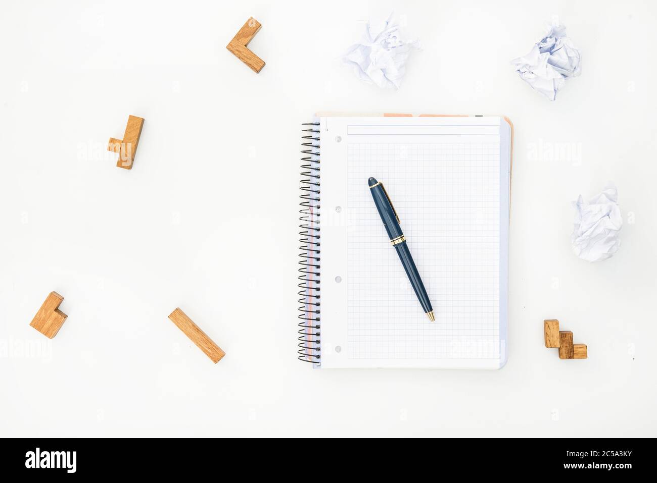 Puzzle, pencil, notebook and crumpled paper Stock Photo - Alamy