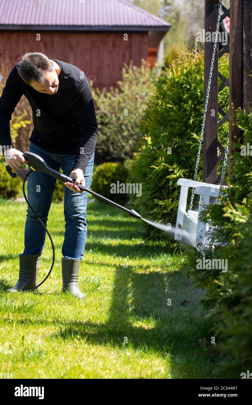 Man power washing house hi-res stock photography and images - Alamy