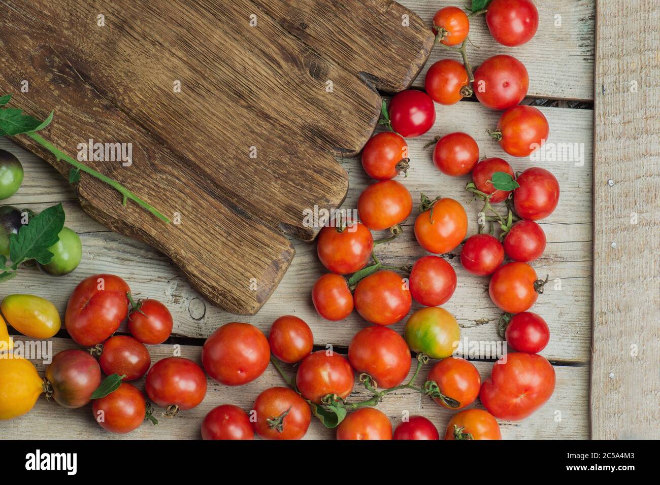 Healthy organic vegetables on a wooden background. Fresh ripe organic ...