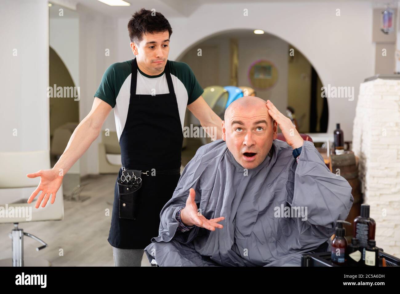Male hairdresser angry hi-res stock photography and images - Alamy