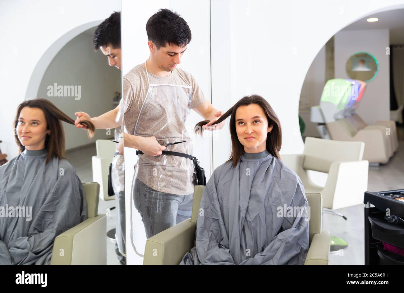 Male hairdresser with female client hi-res stock photography and images ...