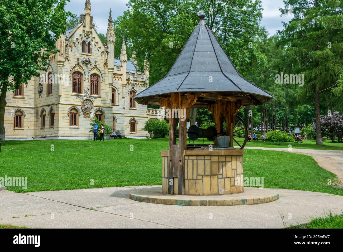 A well in the yard of the Sturdza castle in Miclauseni, Romania Stock ...
