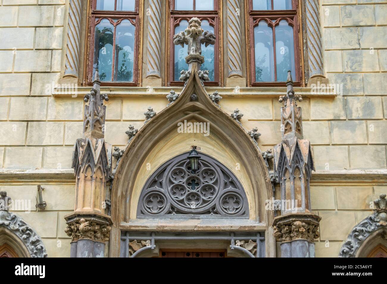 The arch above the entrance to Sturdza castle in Miclauseni, Romania ...
