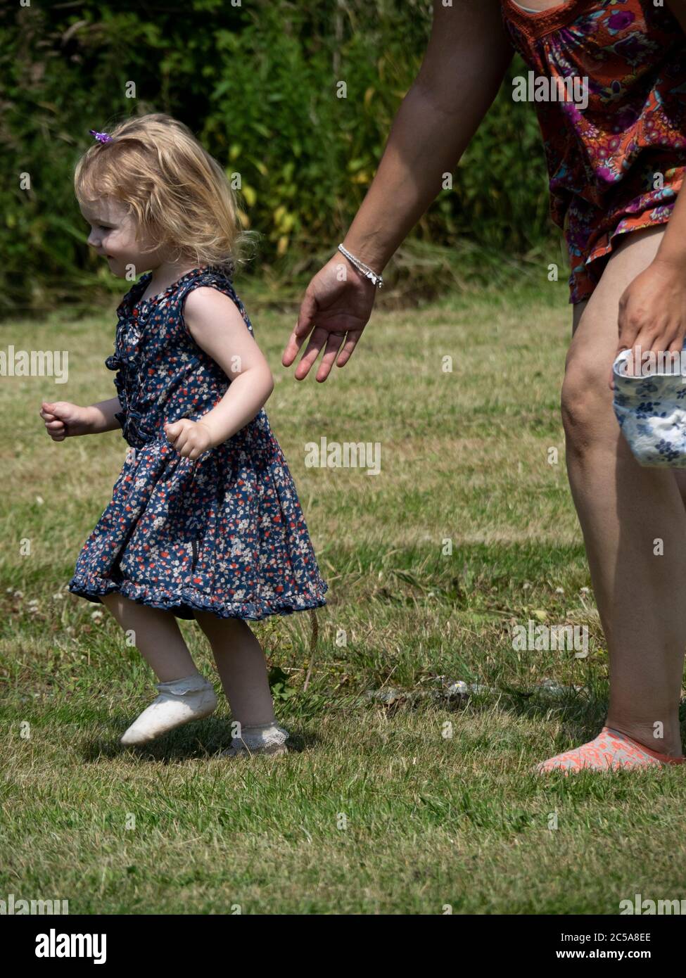Girl child playing chase hi-res stock photography and images - Alamy