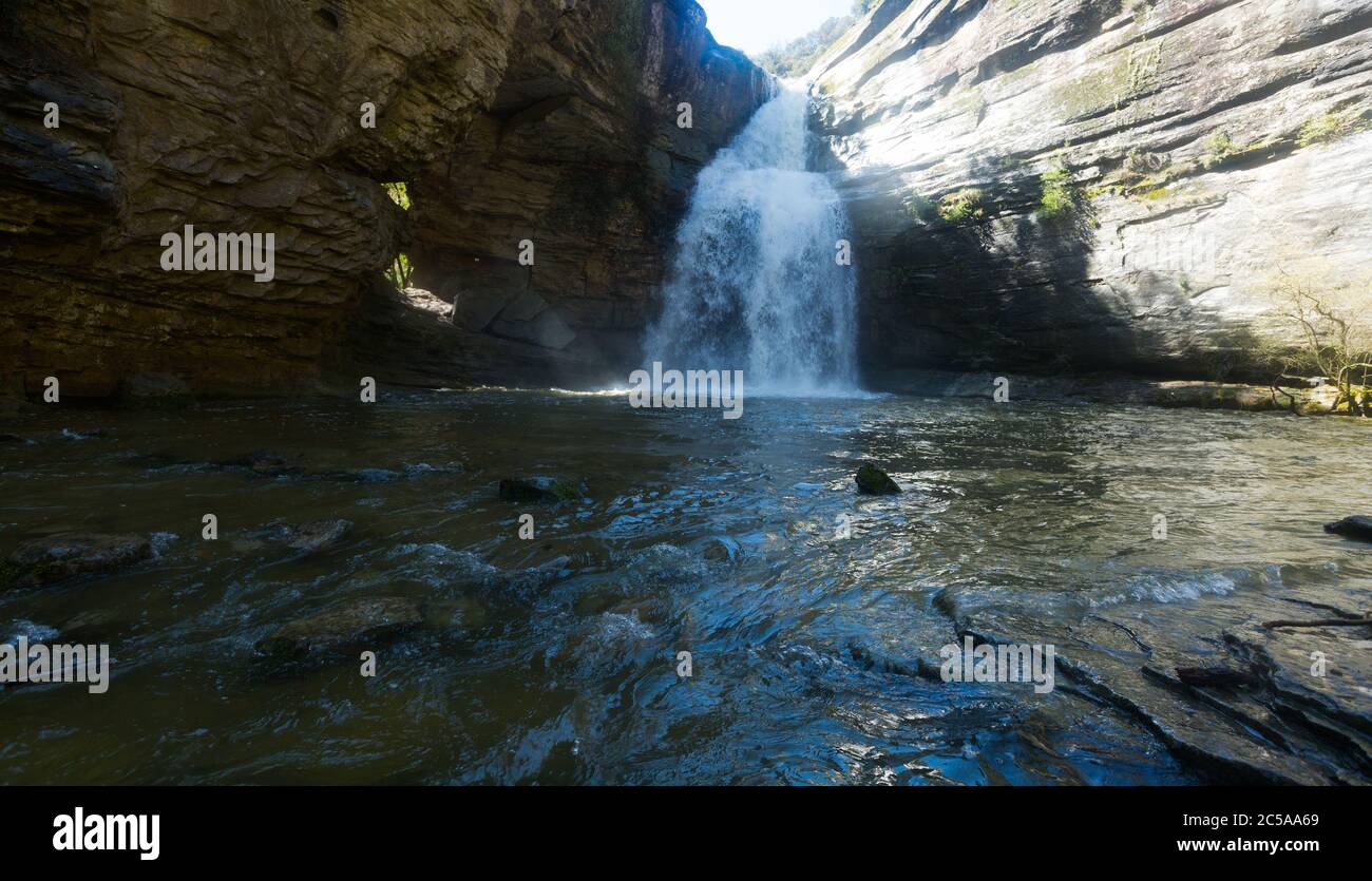Waterfall La Foradada de Cantonigros surrounded by beautiful forests ...