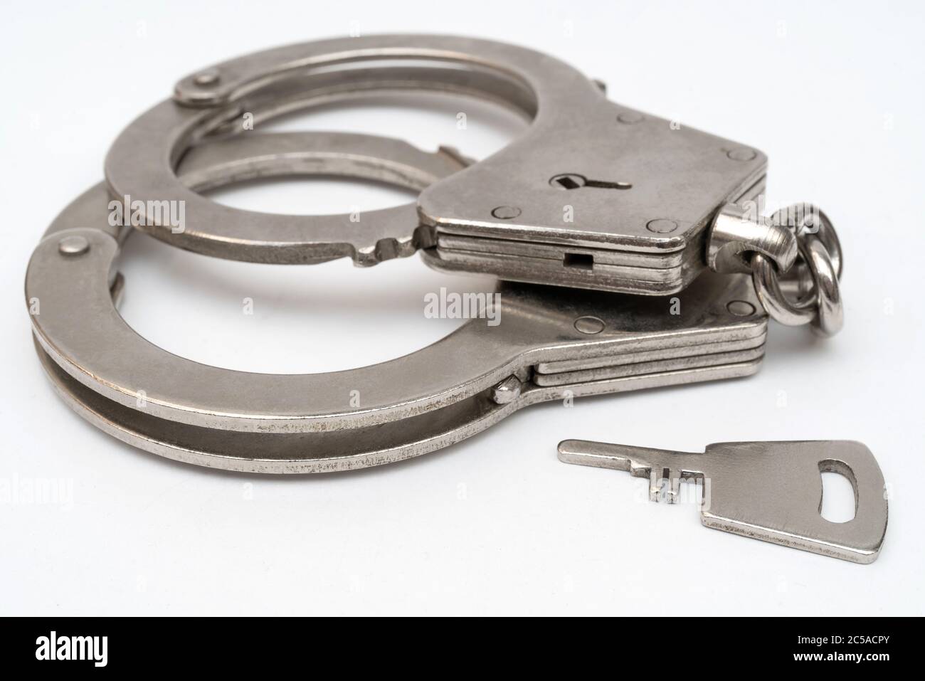 Metal handcuffs. Detention of criminals breaking law. Restriction of ...