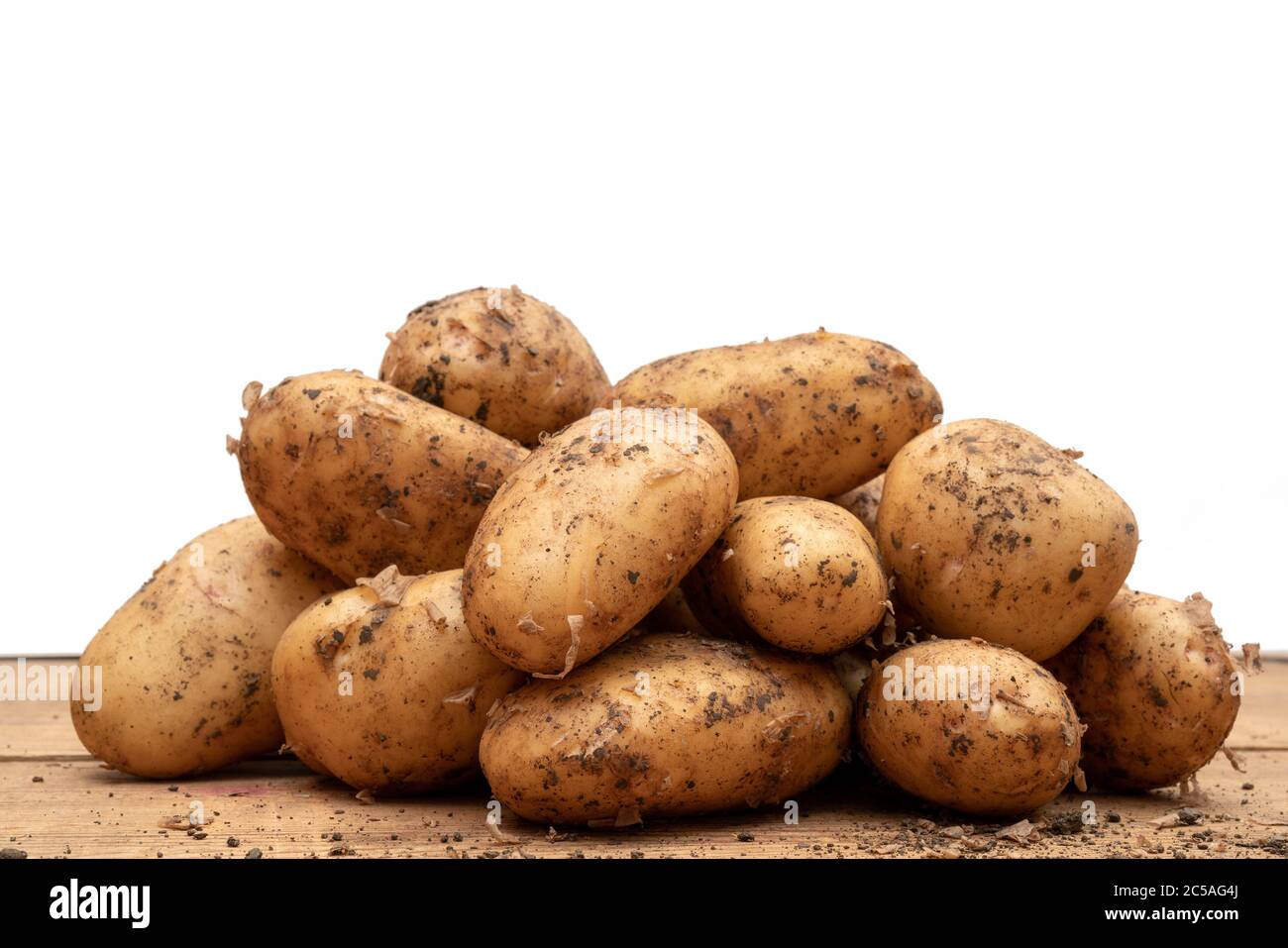 Fresh potatoes dug from ground. Autumn harvest of potatoes Stock Photo ...