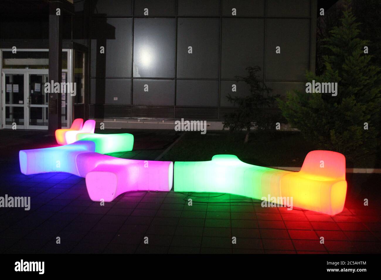 Luminous benches outdoor at night Stock Photo - Alamy
