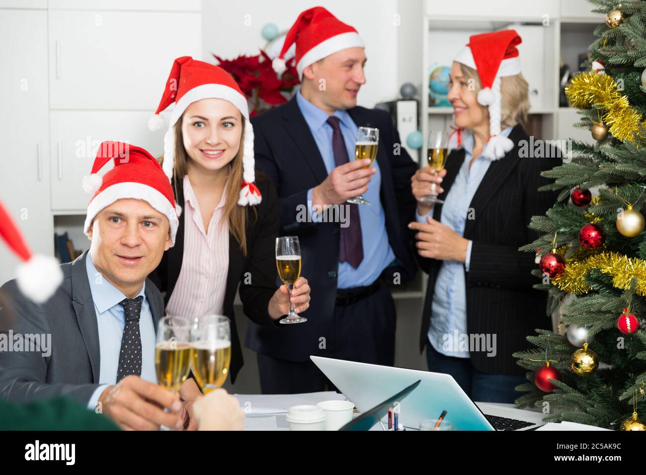 Christmas business cocktail party in office Stock Photo - Alamy