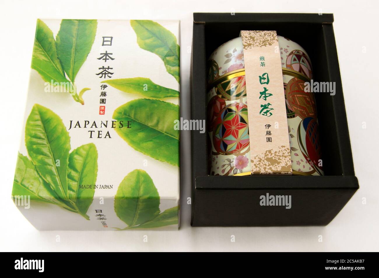 Box of Japanese green tea with an ornate metal tea caddy Stock Photo ...