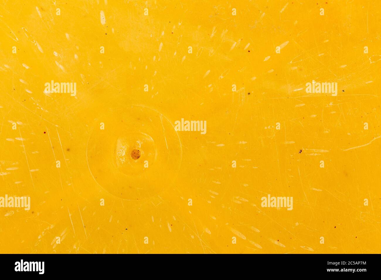 close-up flat texture and background of yellow bakelite or carbolite ...