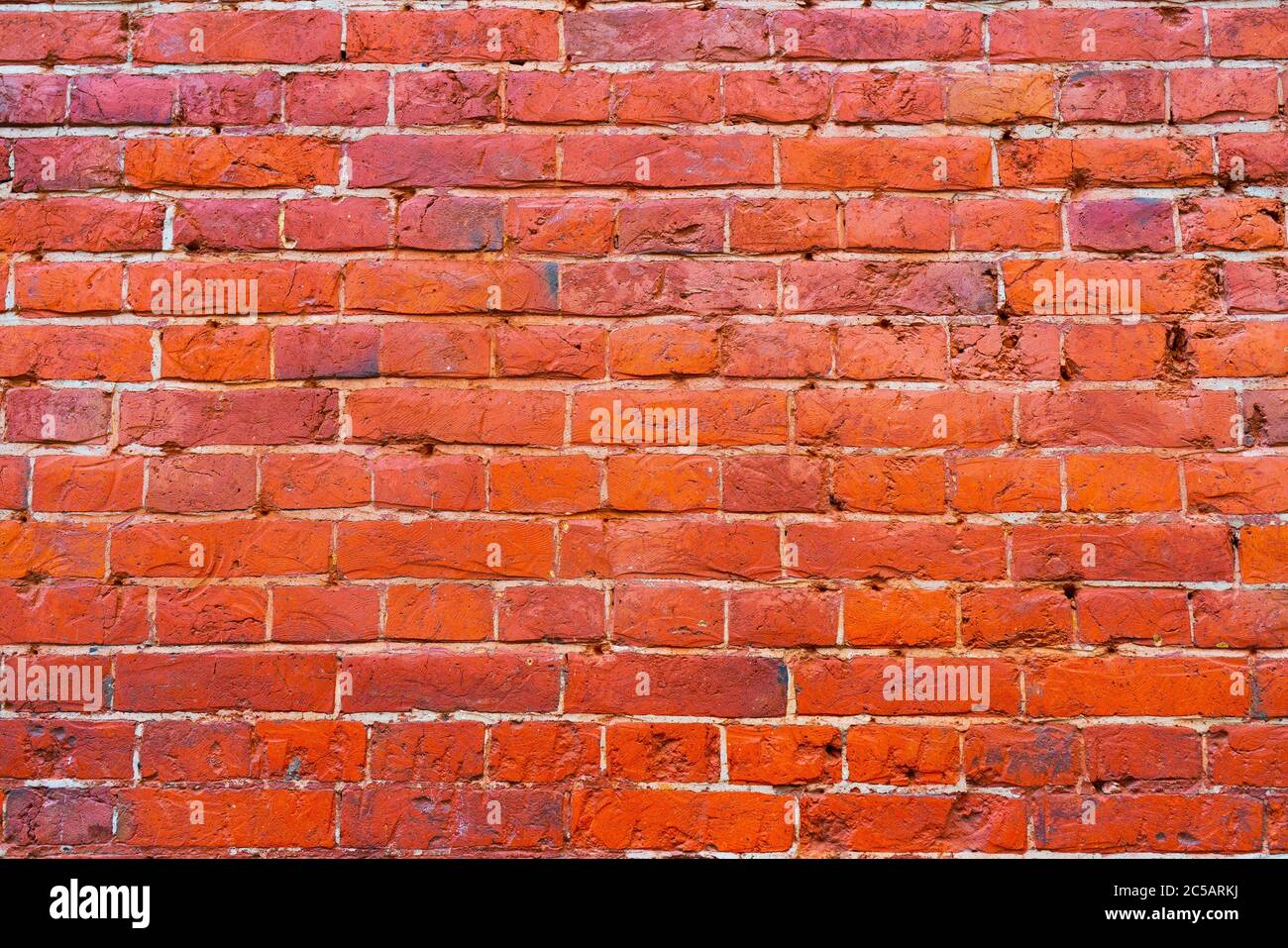 Wall of red brick. Designer interior background. Abstract architectural ...