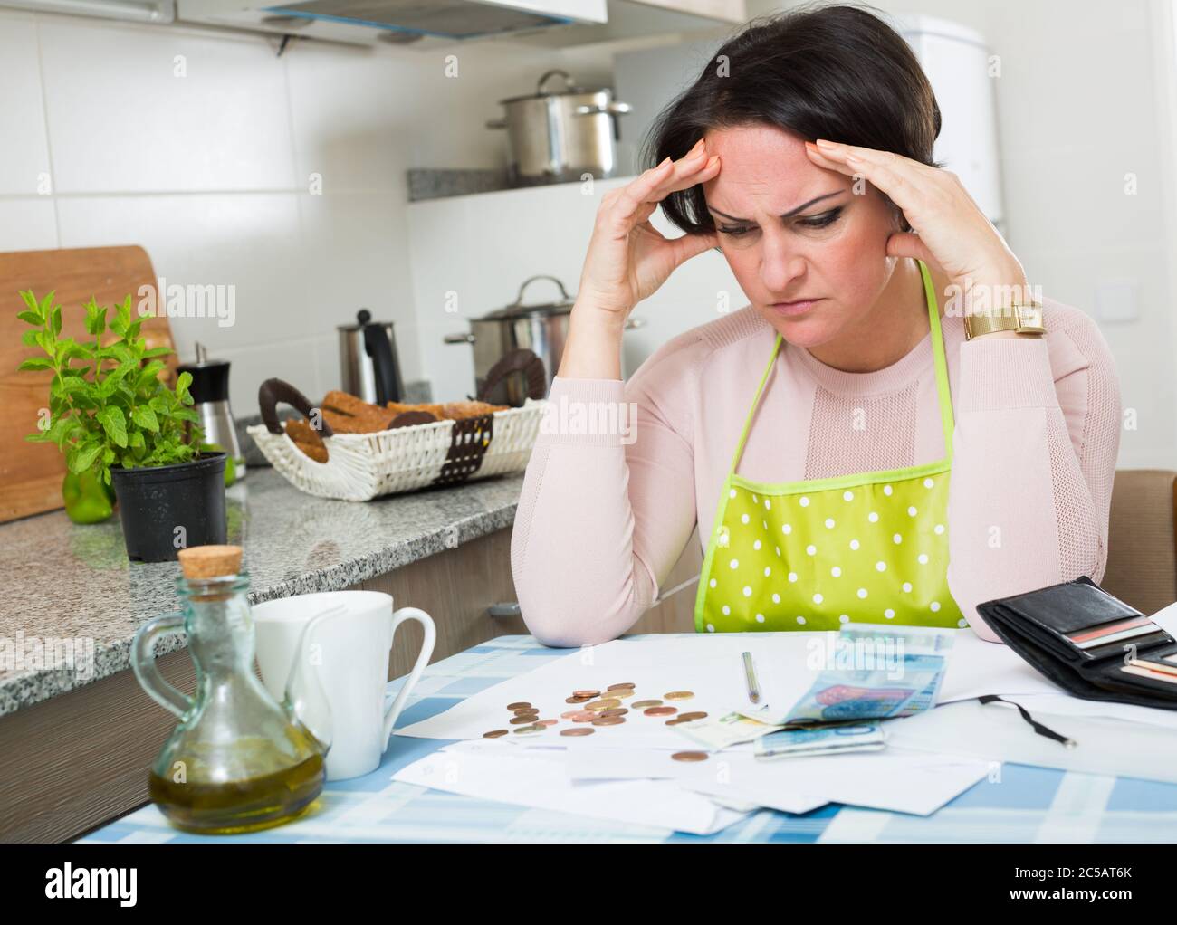 Portrait upset housewife counting hi-res stock photography and images ...
