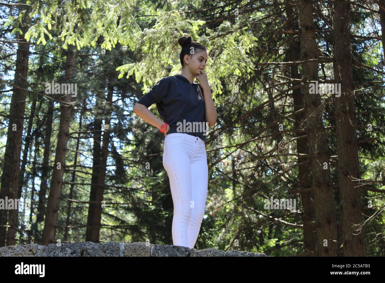 Young girl in forest Stock Photo - Alamy