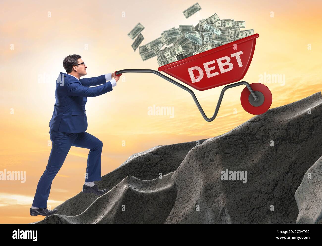 The businessman pushing wheelbarrow uphill in debt loan concept Stock ...