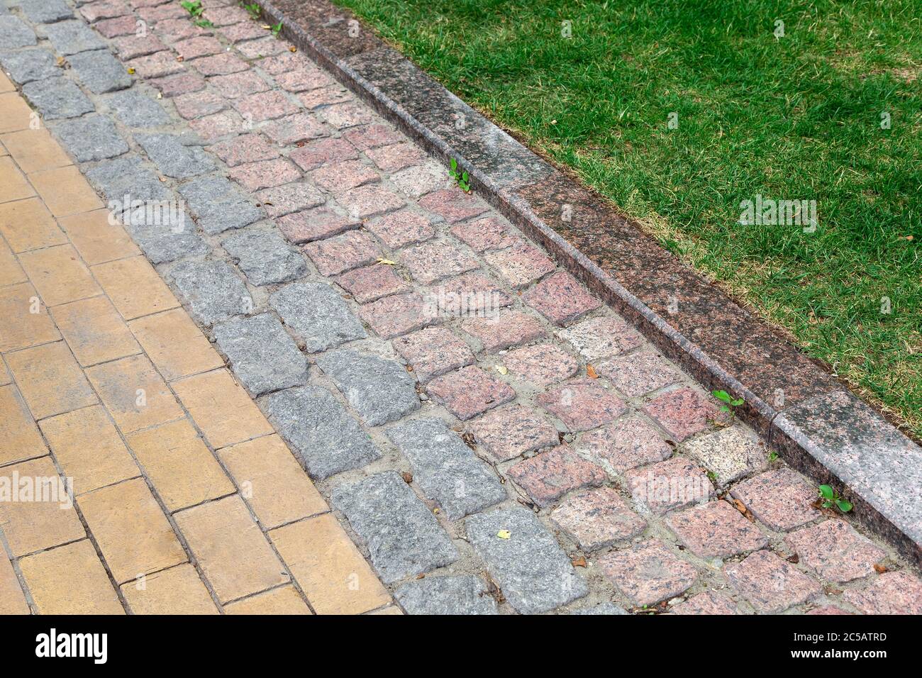 Footpath made stone tiles hi-res stock photography and images - Alamy