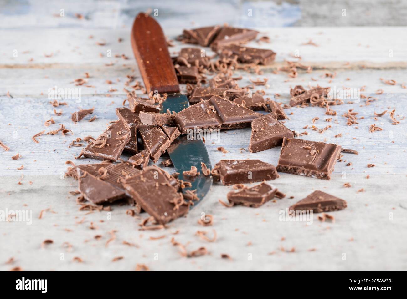 Chocolate chopped with a knife Stock Photo - Alamy