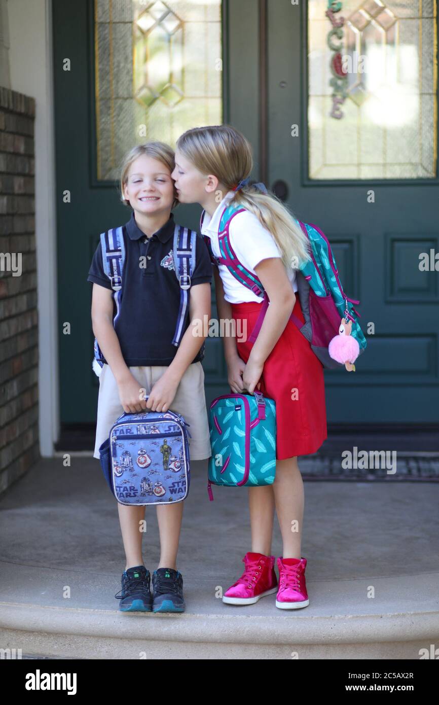 Brother sister school uniforms hi-res stock photography and images - Alamy