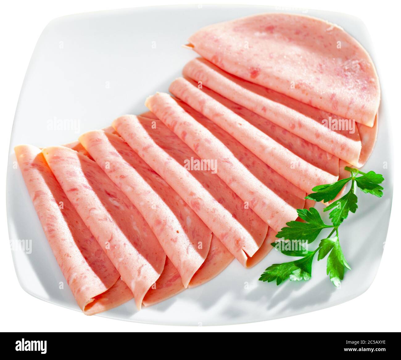 Sliced boiled pork ham served with parsley. Isolated over white ...