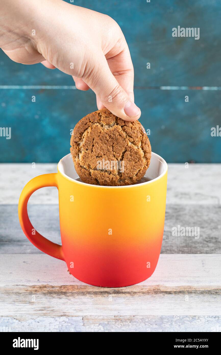 Dipping biscuit tea hi-res stock photography and images - Alamy