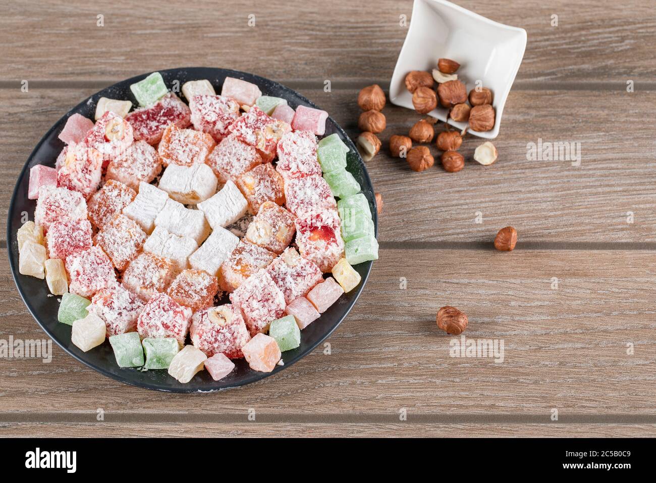 Colorful lokum candies and nuts Stock Photo - Alamy