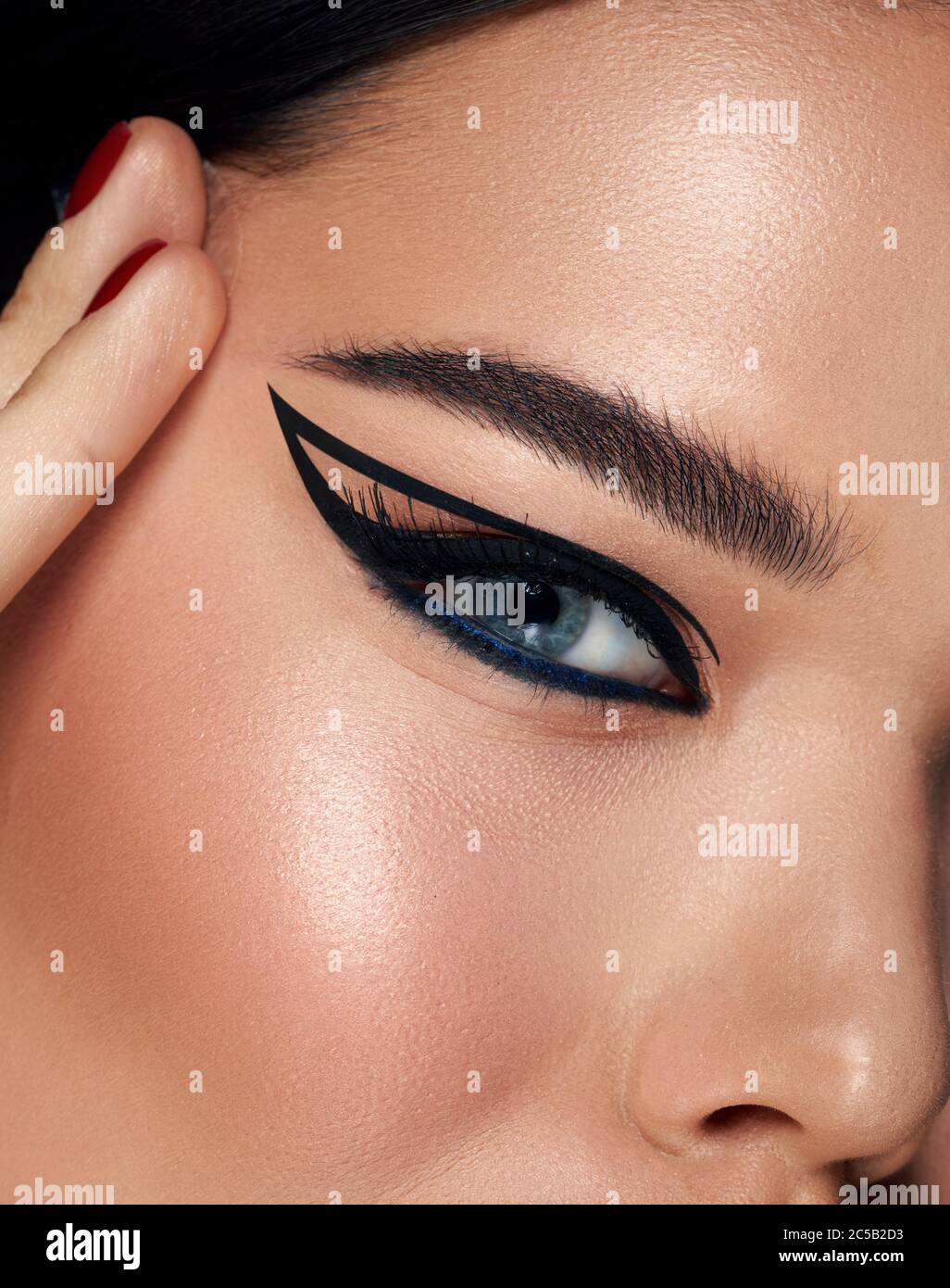 Beautiful woman portrait blonde hair and healthy skin. perfect eyeliner ...