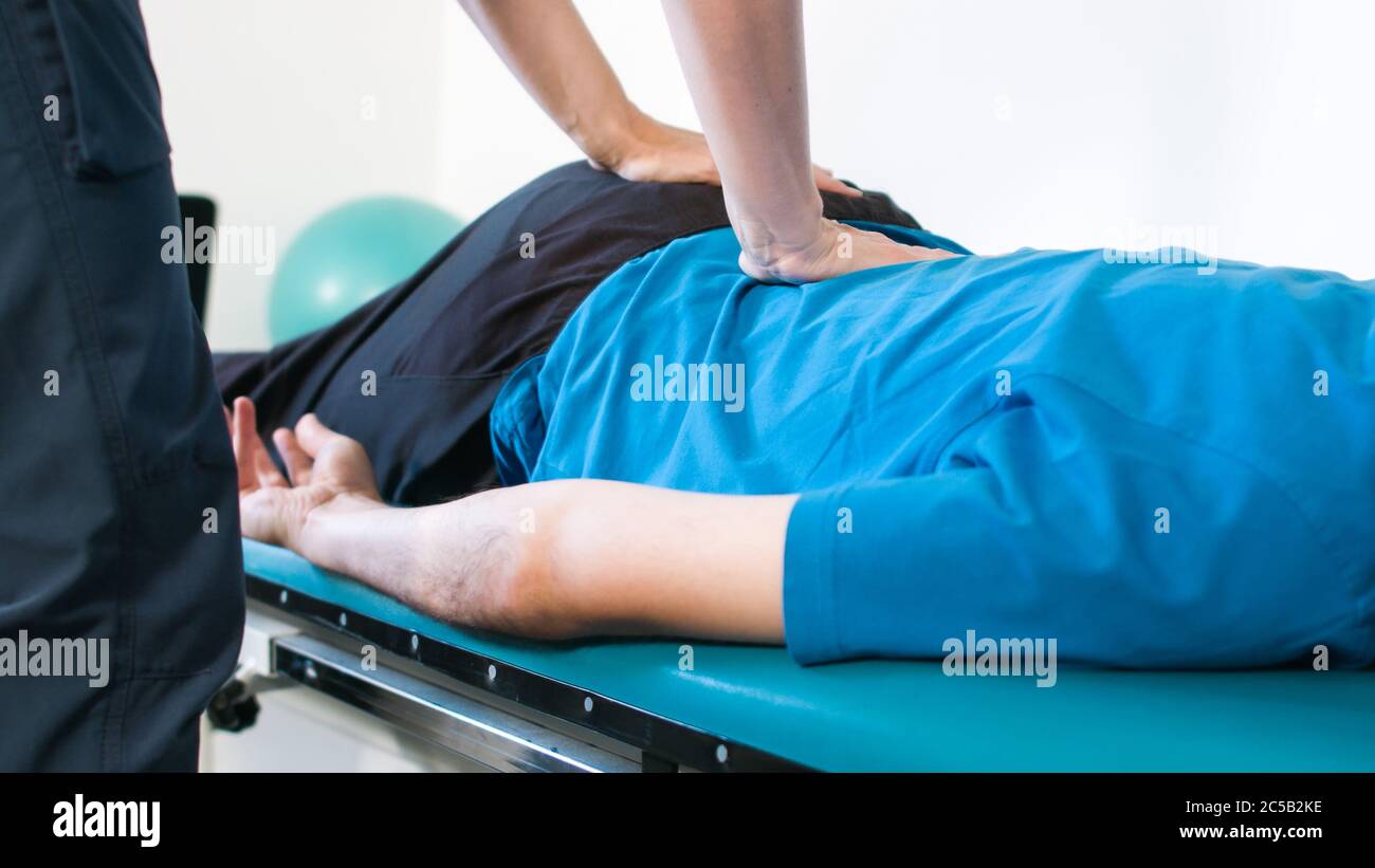 Disabled disability massage masseur hi-res stock photography and images ...