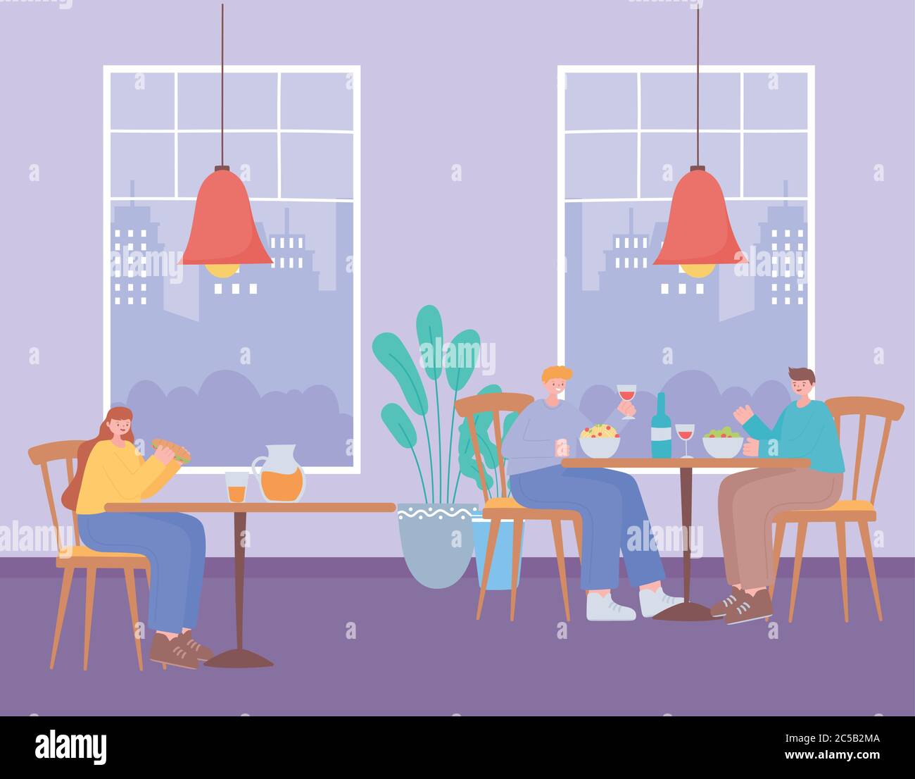 restaurant social distancing, people sit a distance eating dinner ...