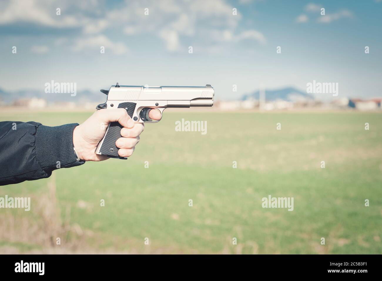 Gun finger hi-res stock photography and images - Alamy