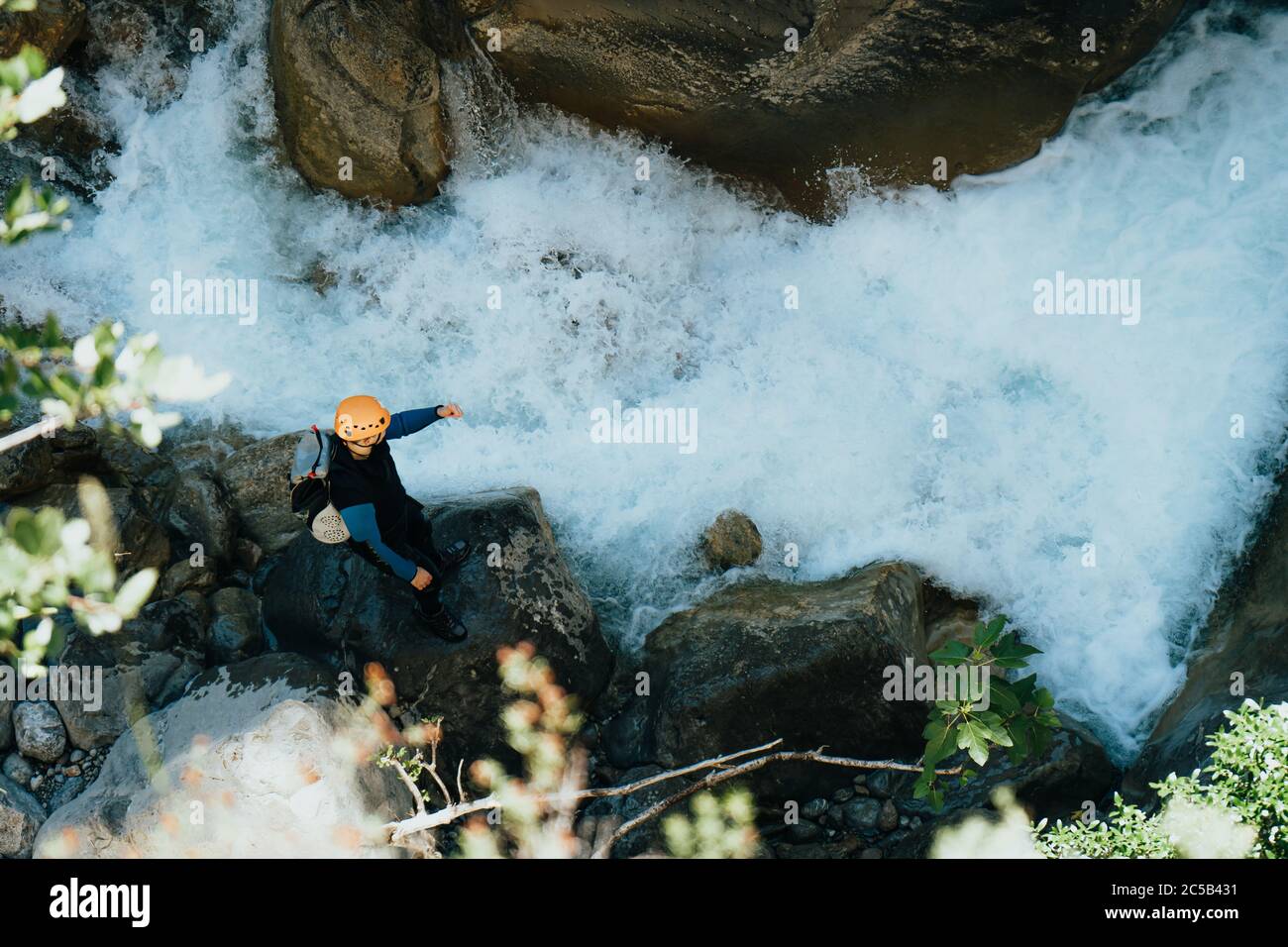 Beautiful top angle shot people doing extreme sports over a river ina ...
