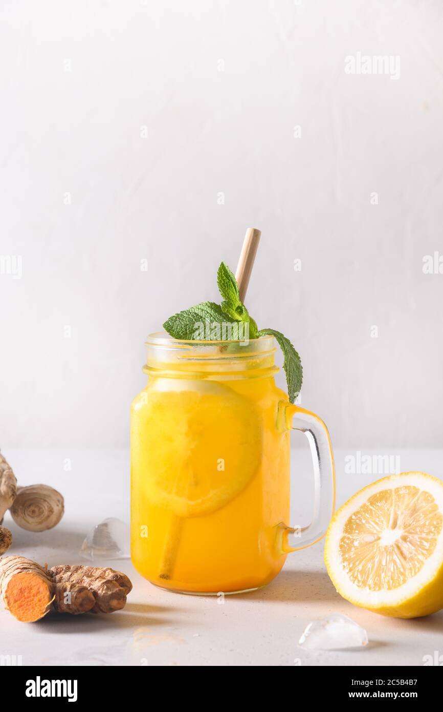 Jamu Indonesian herbal beverage with turmeric, ginger, lemon Stock ...