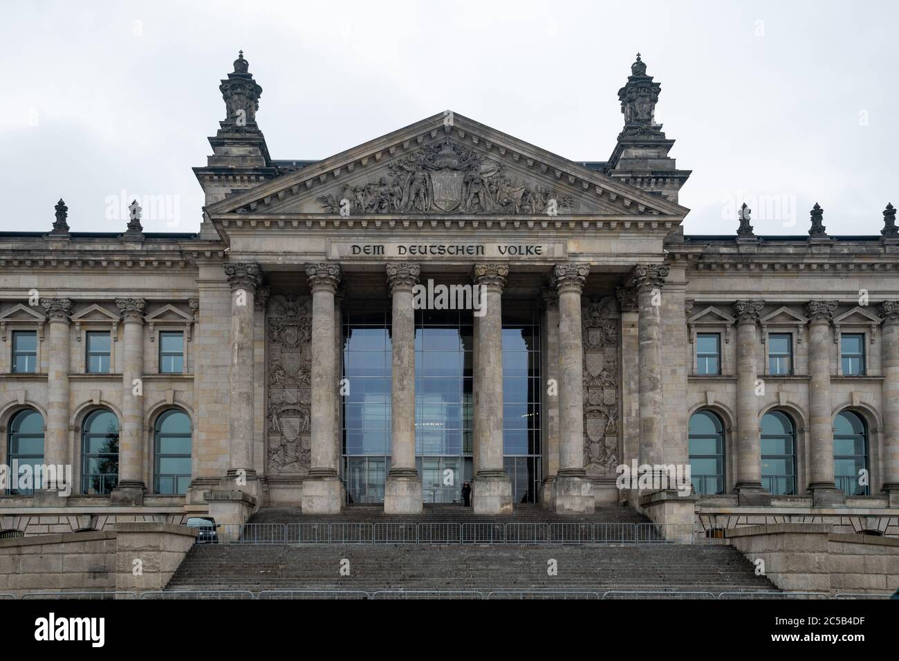 Front view of the main entrance of the Reichstag with the dedication ...