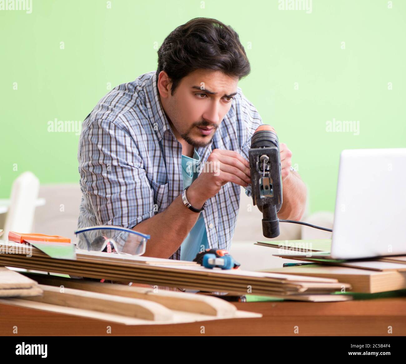 The woodworker working in his workshop Stock Photo - Alamy
