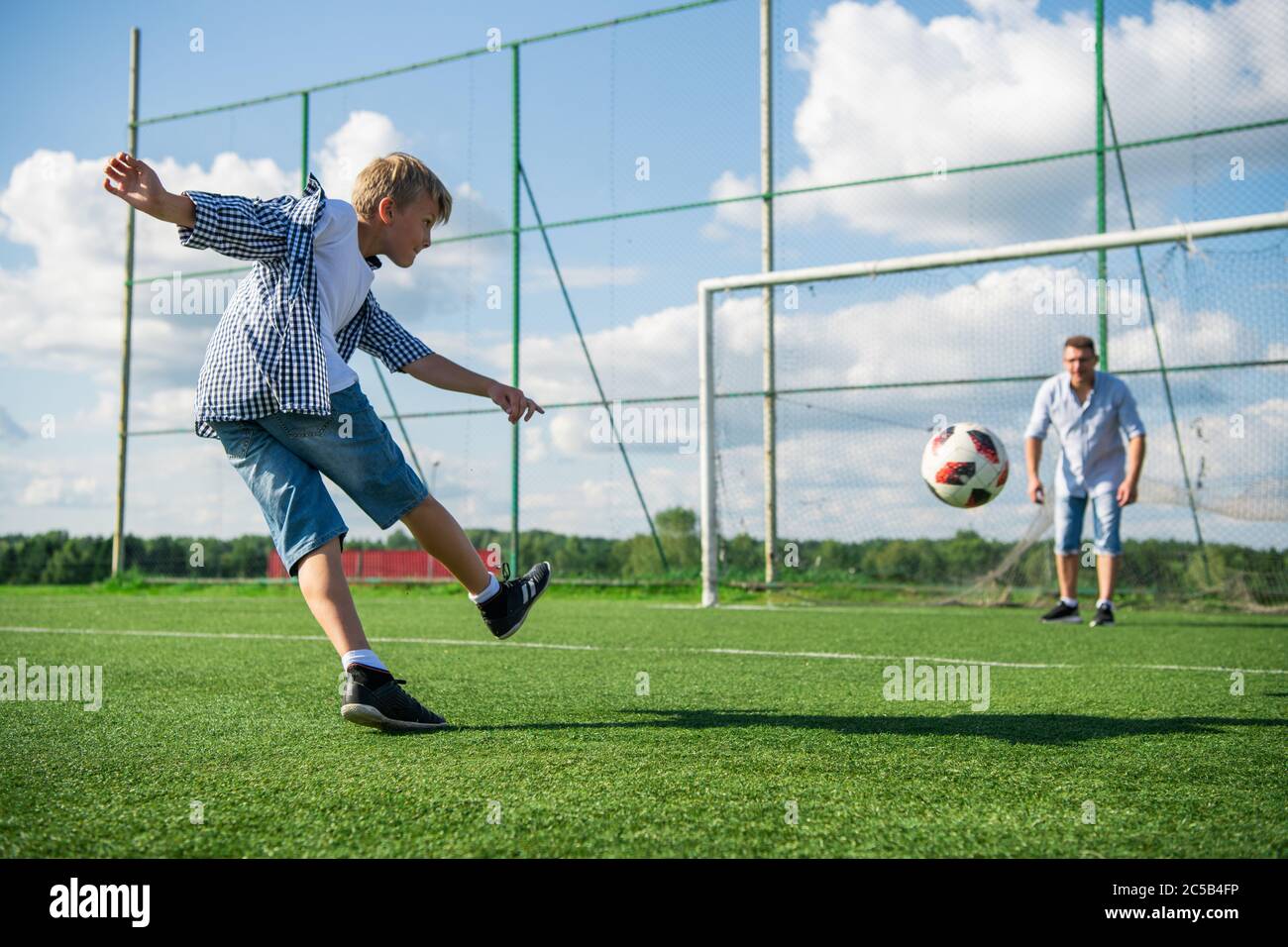 Kicking a penalty hi-res stock photography and images - Alamy