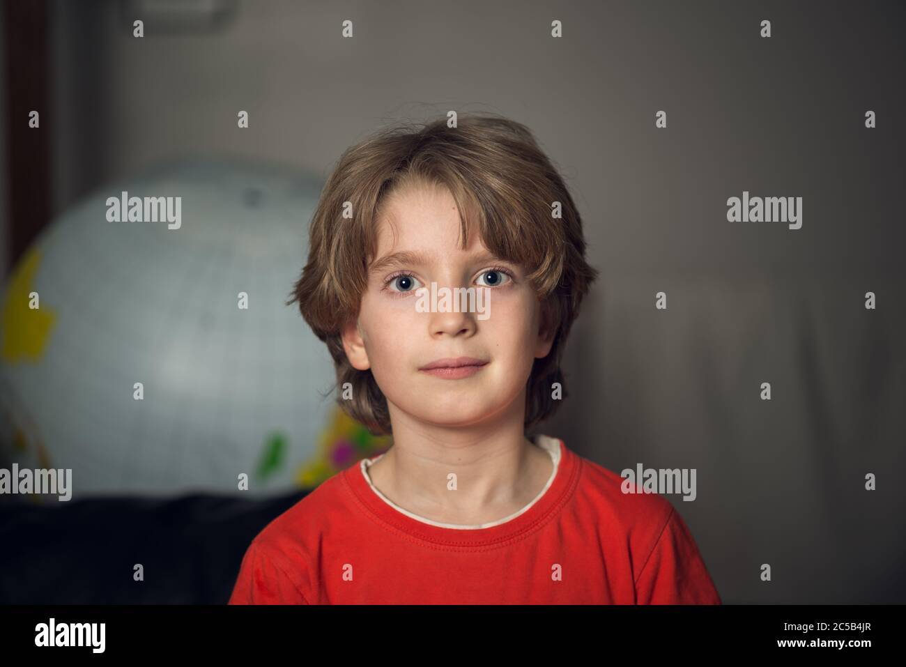 Portrait of a boy with red shirt Stock Photo - Alamy