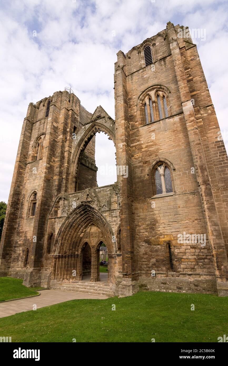 Vertical low angle shot of the facade of the beautiful Elgin Cathedral ...