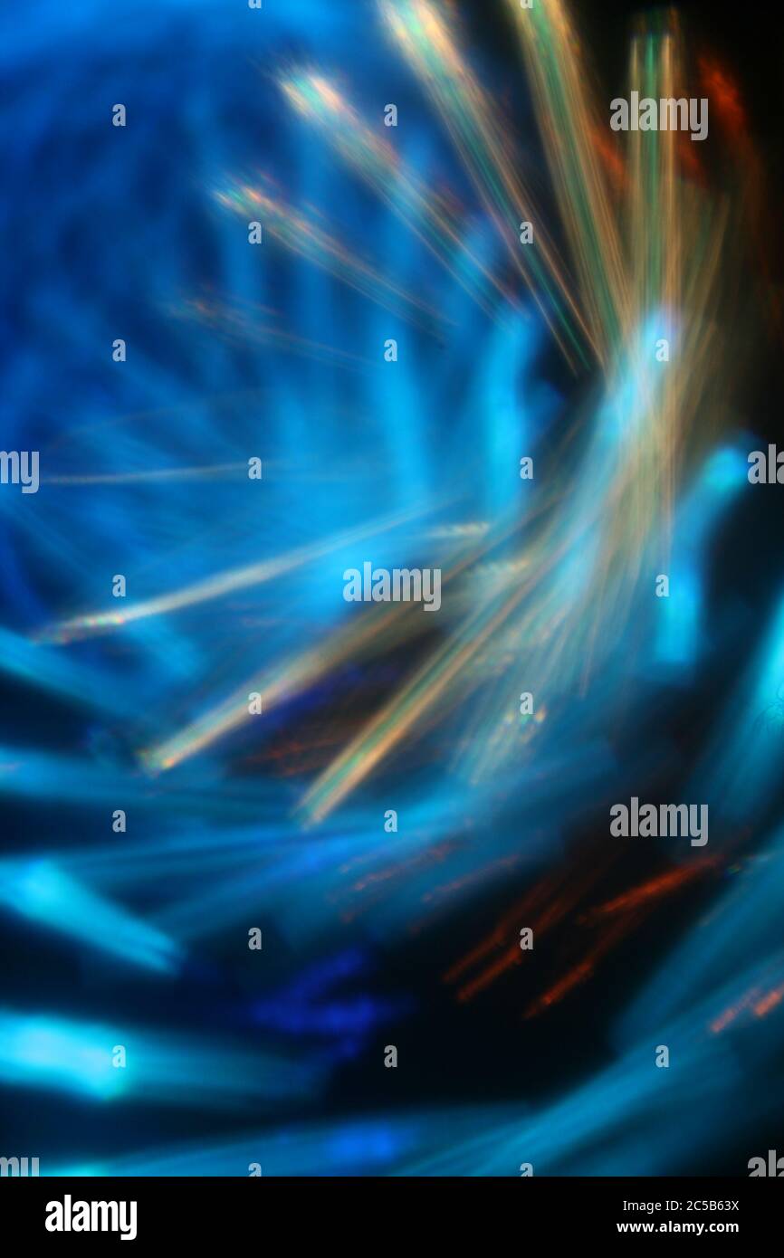 Vertical shot of staggered and refracted light layers-vortex light ...