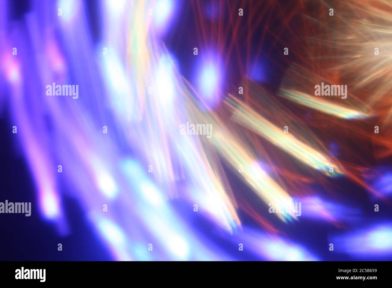 Horizontal shot of staggered and refracted light layers-vortex light ...