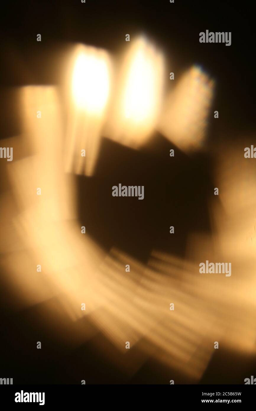 Vertical shot of staggered and refracted light layers-vortex light ...