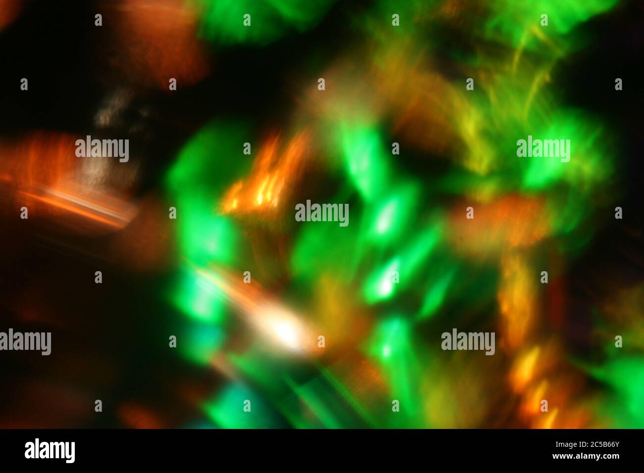 Horizontal shot of staggered and refracted light layers-vortex light ...