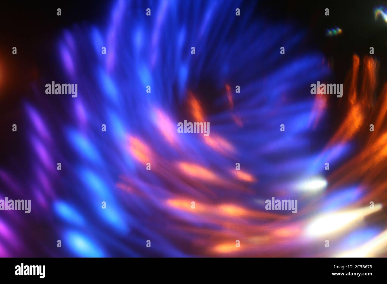 Horizontal shot of staggered and refracted light layers-vortex light ...