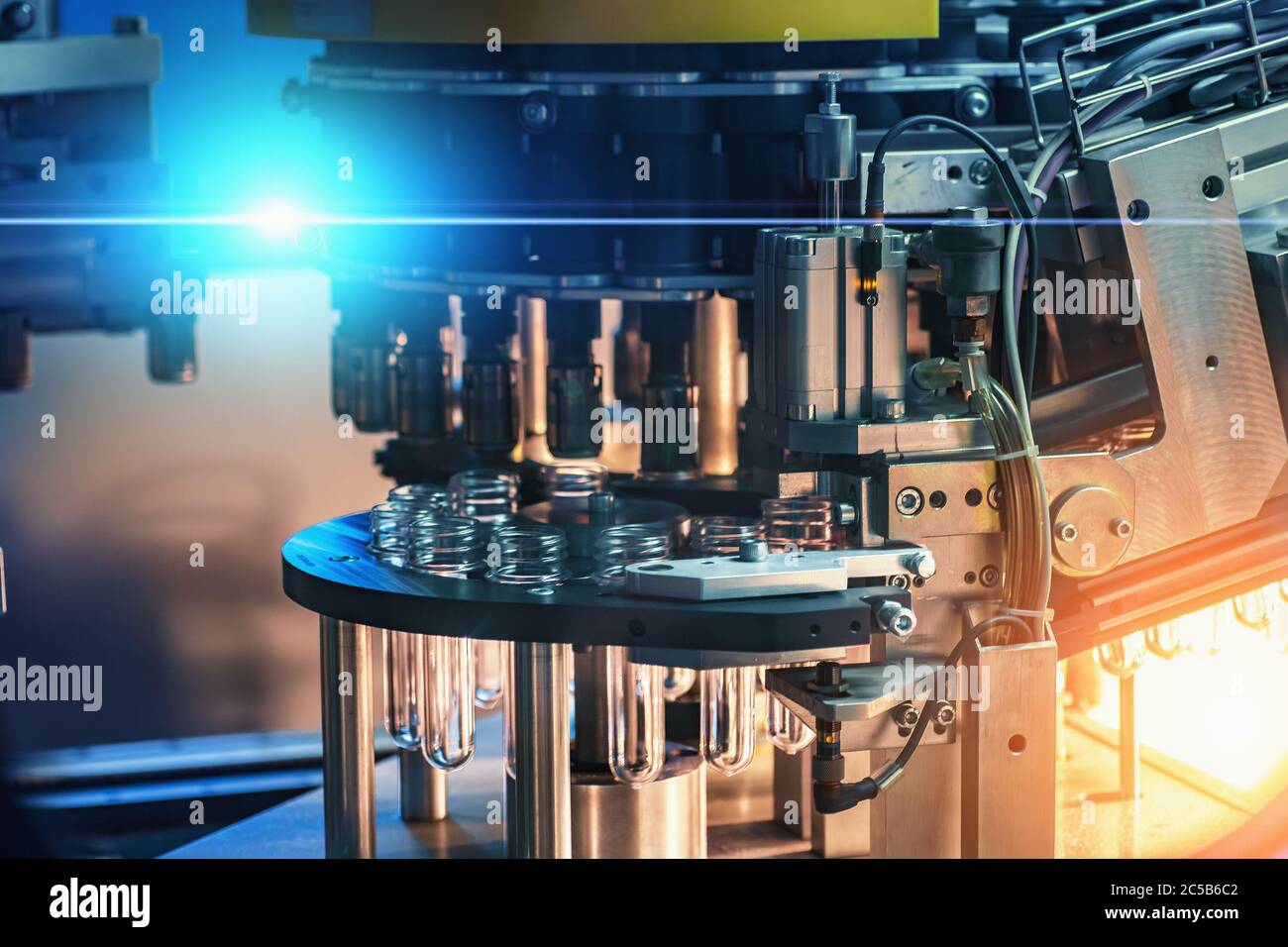 Industrial automated machine for blowing plastic bottles from PET ...