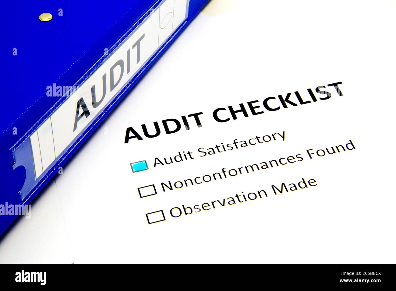 Audit checklist, with tick against "audit satisfactory Stock Photo - Alamy