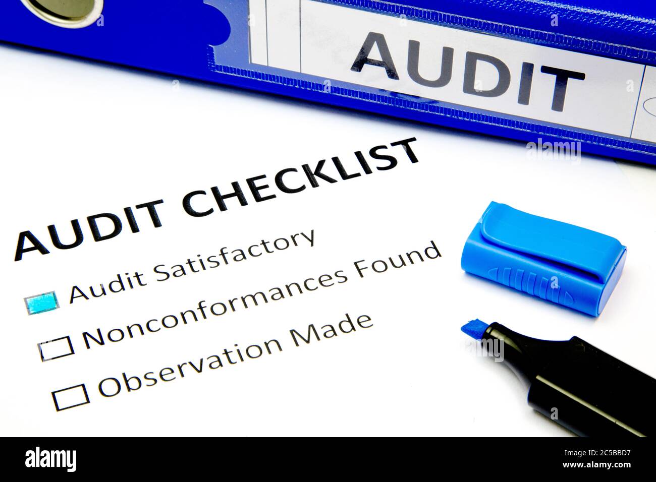 Audit checklist, with tick against "audit satisfactory Stock Photo - Alamy