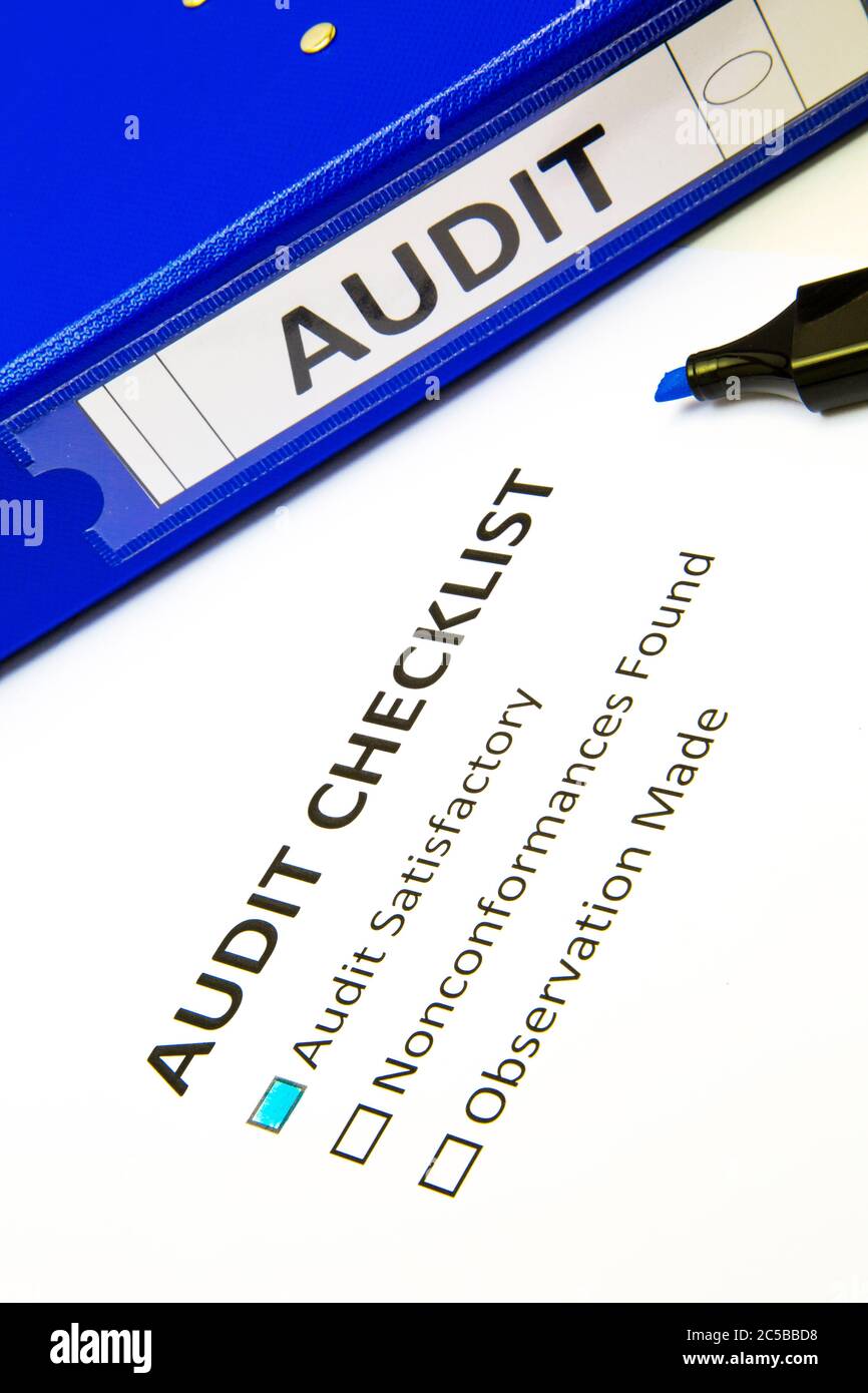 Audit checklist, with tick against "audit satisfactory Stock Photo - Alamy