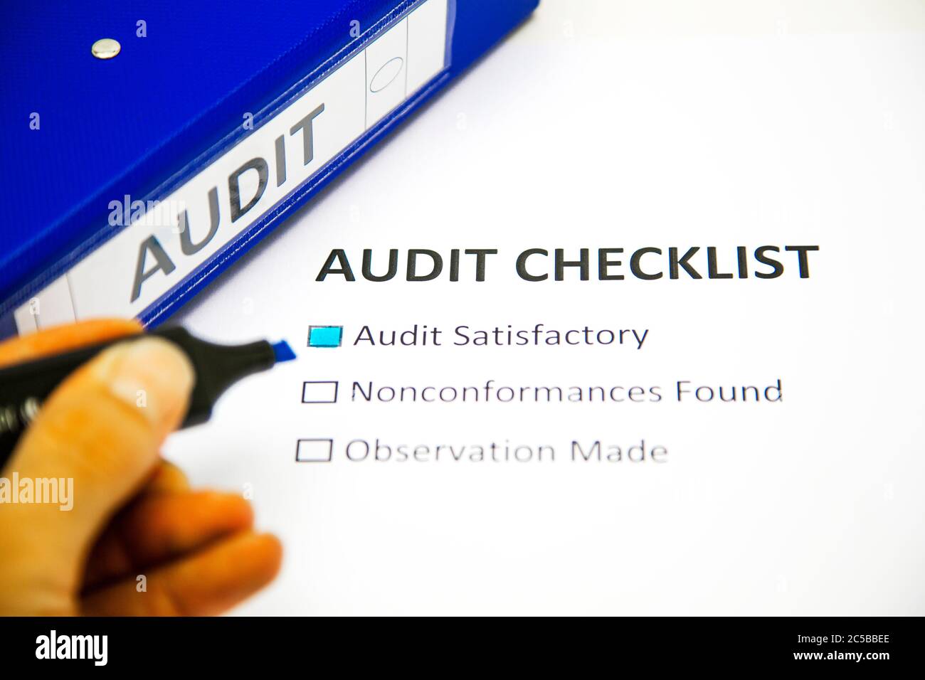 Audit checklist, with tick against "audit satisfactory Stock Photo - Alamy