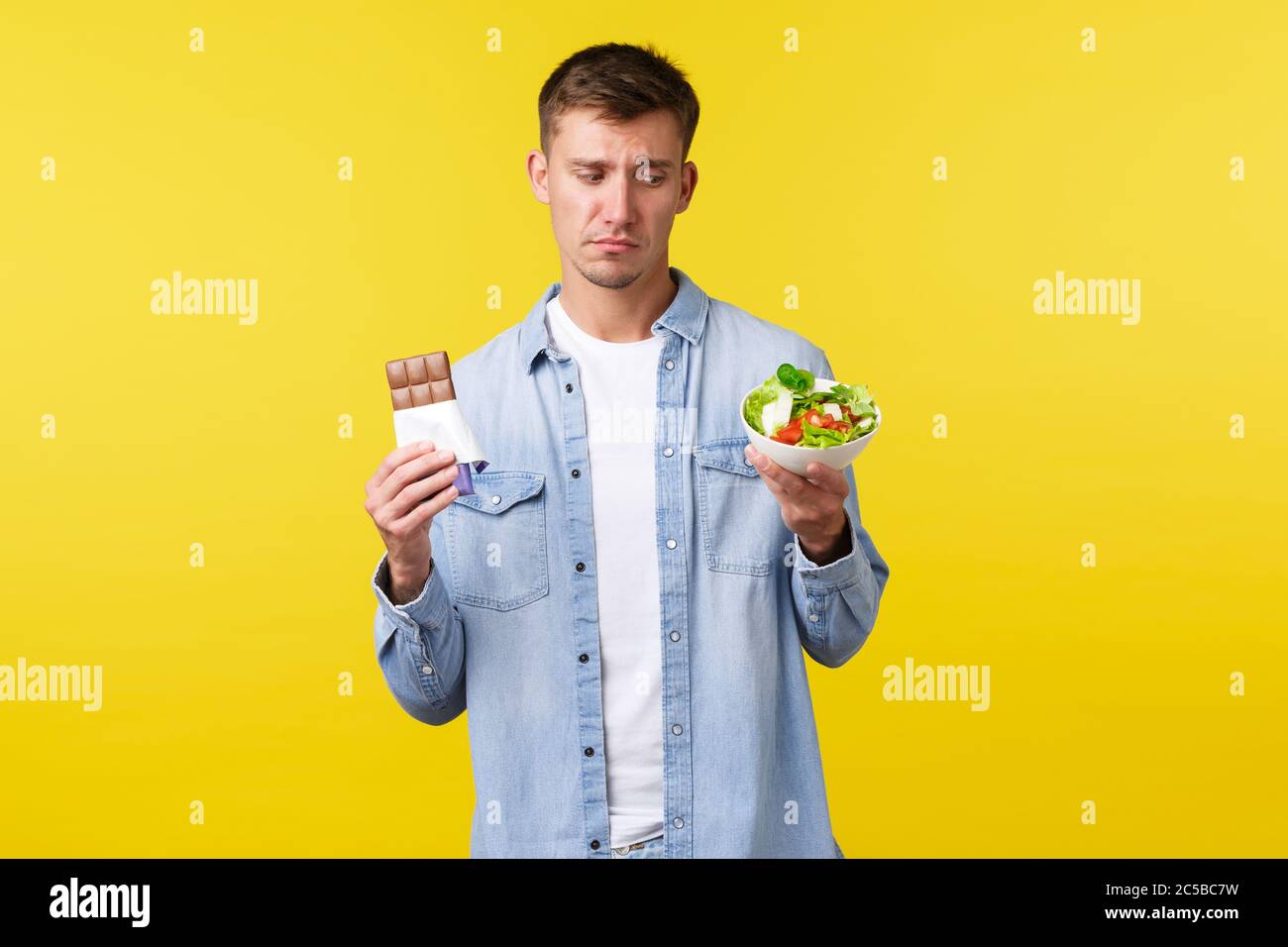 Healthy lifestyle, people and food concept. Displeased and reluctant ...