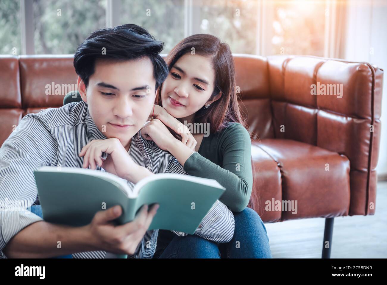 Woman reading romantic book indoor hi-res stock photography and images ...